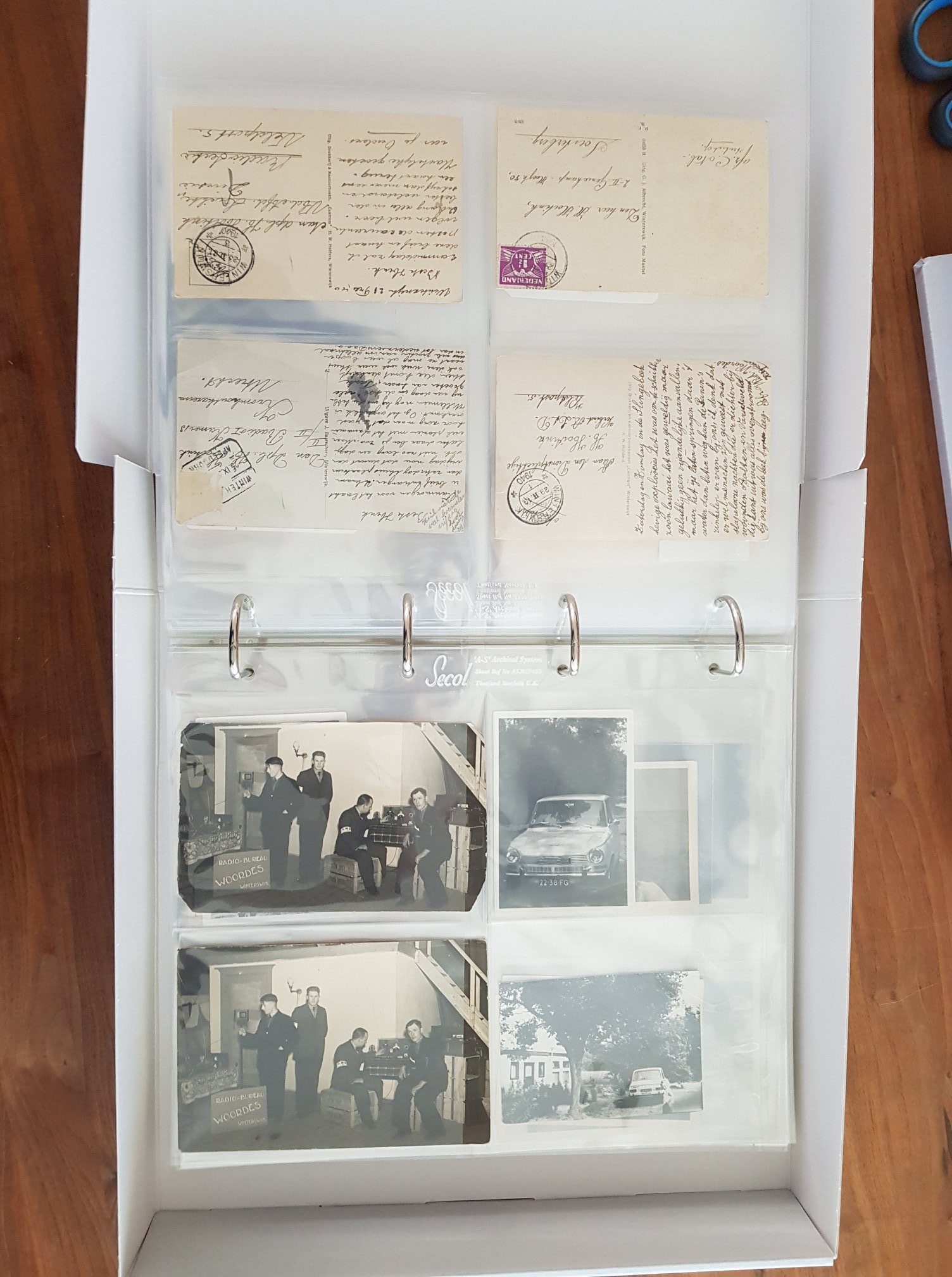 What file format should I use to preserve family photos?